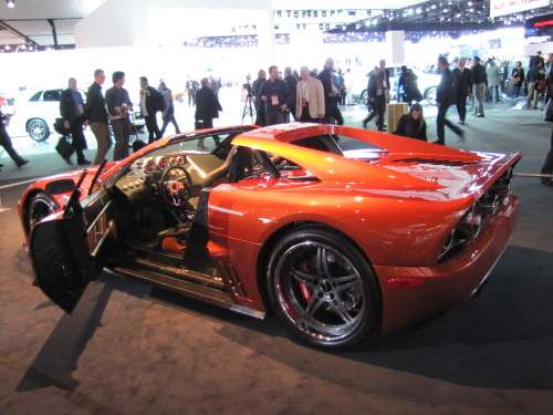 Open door and rear quarter view of Falcon F7 | Torque News